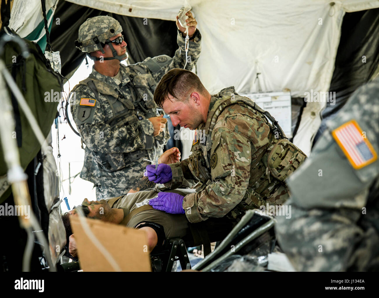 New York Army National Guard medics, assigned to Headquarters Co., 1st ...
