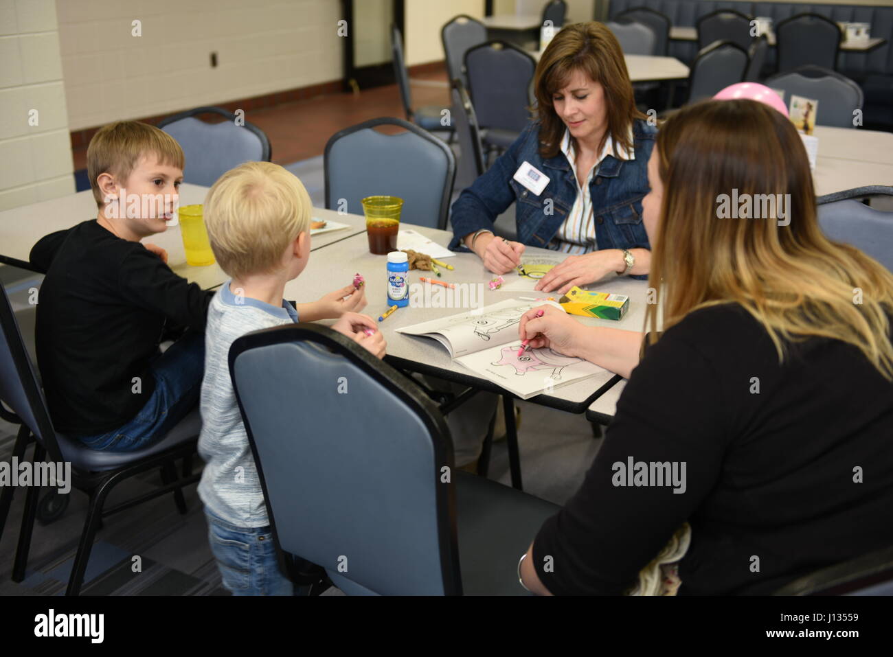 Children of a deployed Air Guardsman color at a station set up by the ...