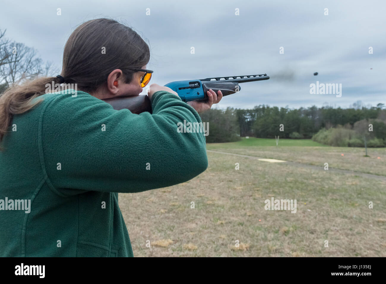 Jeff Madore fires a shotgun during a skeet shooting competition hosted ...