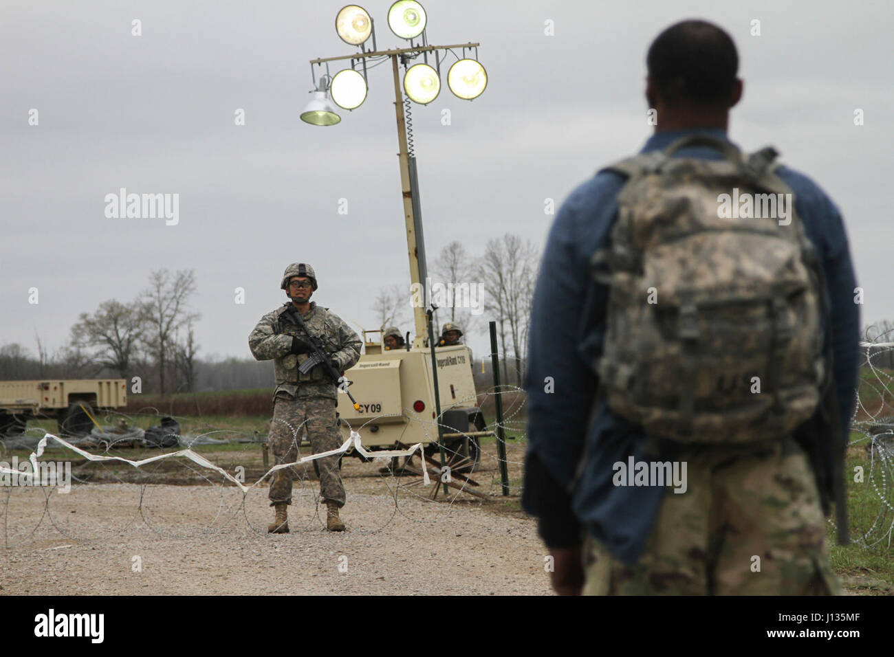 The noncommissioned officer in charge of the entry control point for ...