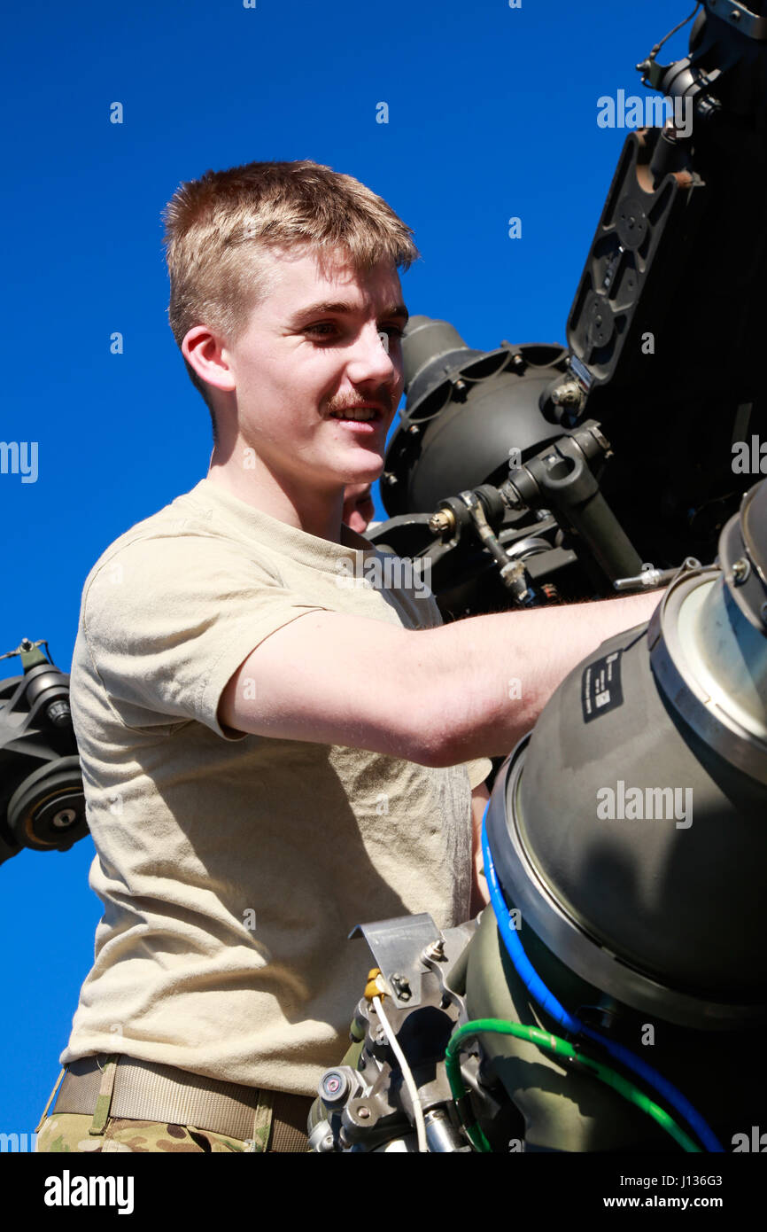 U.S. Army Spc. Joshua Tower, an AH-64E Apache helicopter mechanic ...
