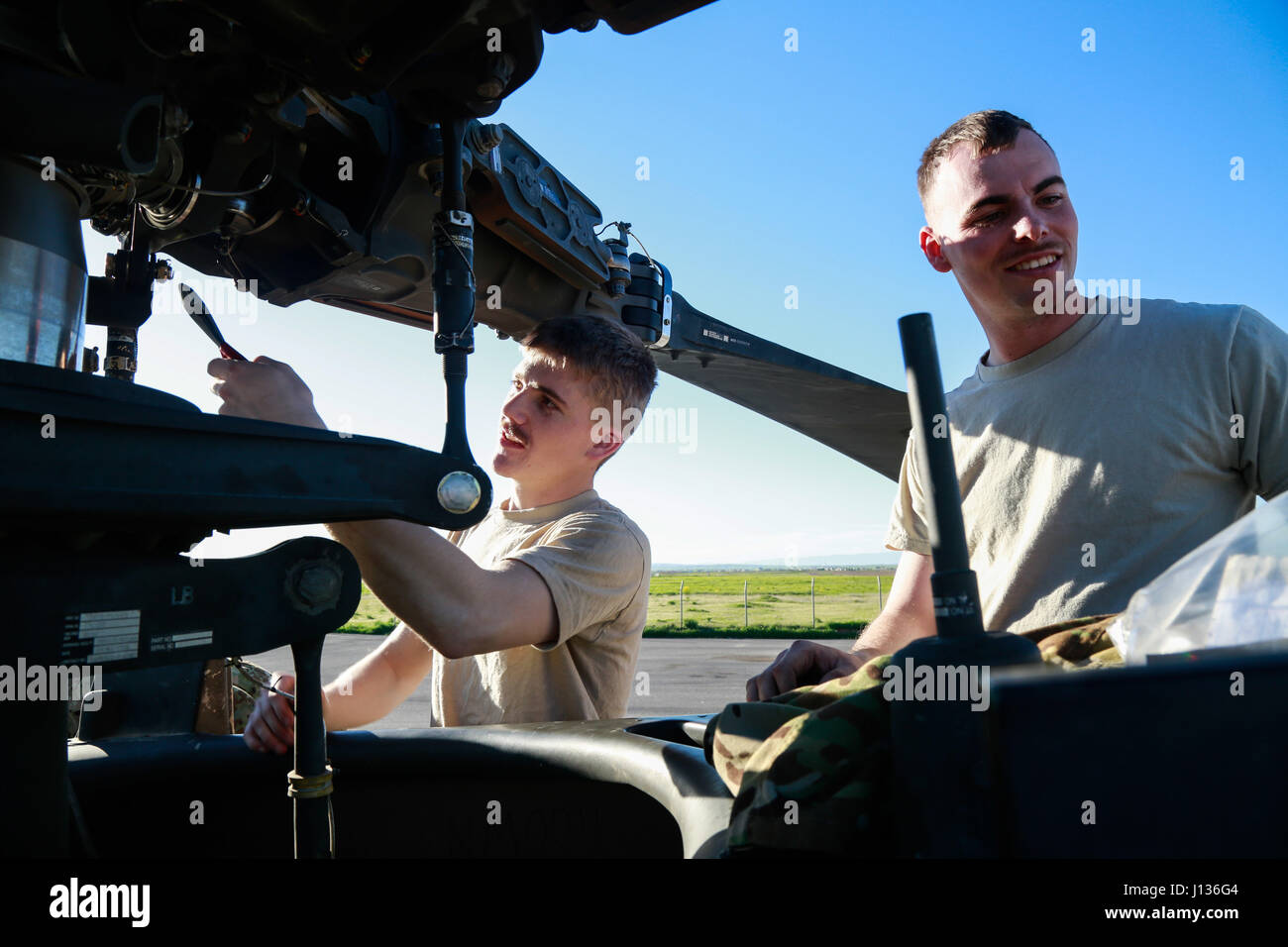 U.S. Army Spc Joshua Tower, left, and Pfc. Codey Herman, AH-64E Apache ...