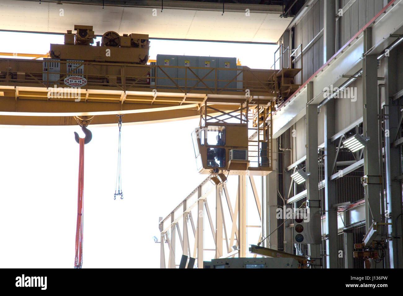 Gerald Miles, crane operator, sits in the cab of the main crane in ...