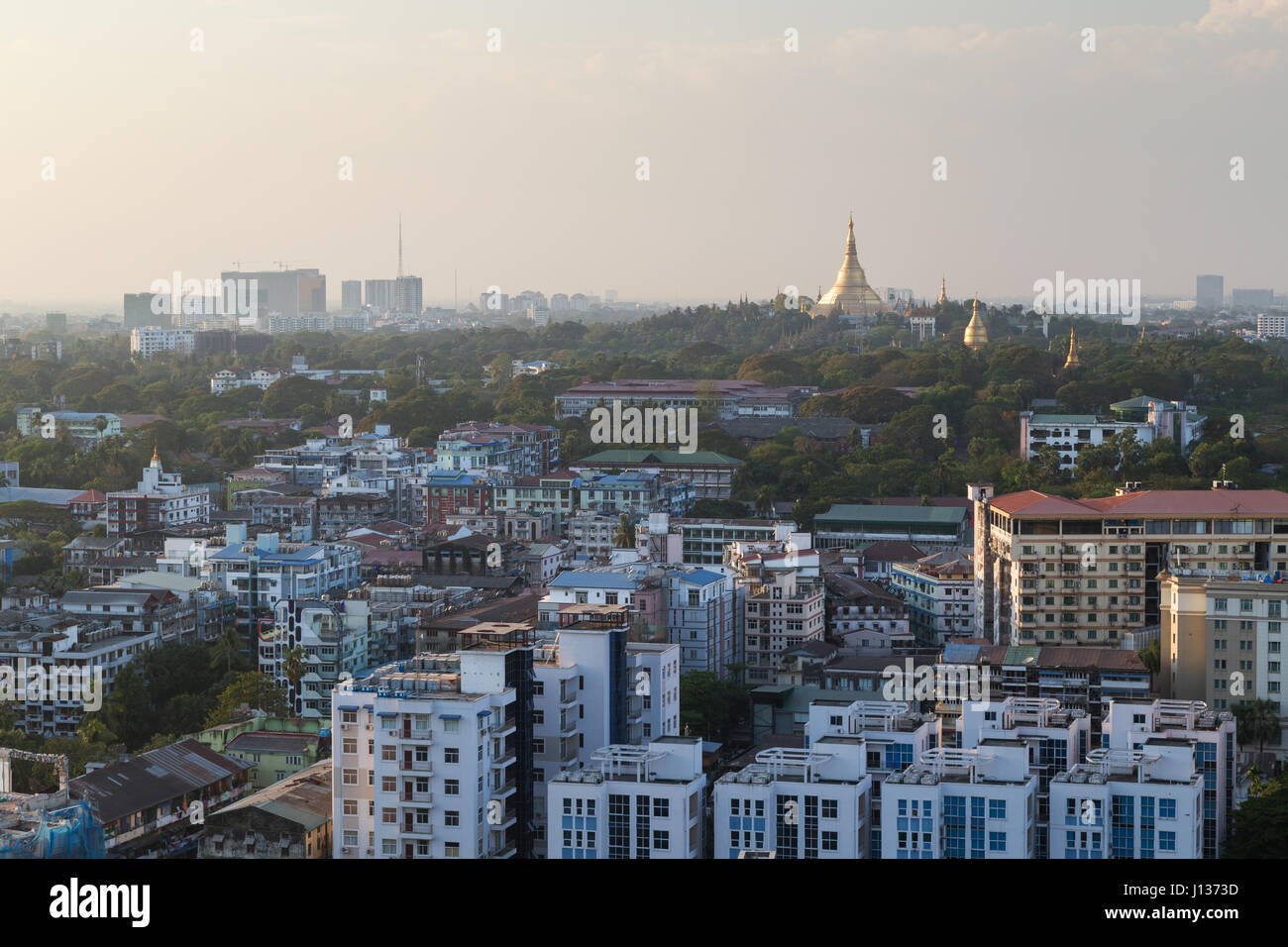 View of Yangon, Myanmar, from above in daylight. Shwedagon Pagoda is in ...