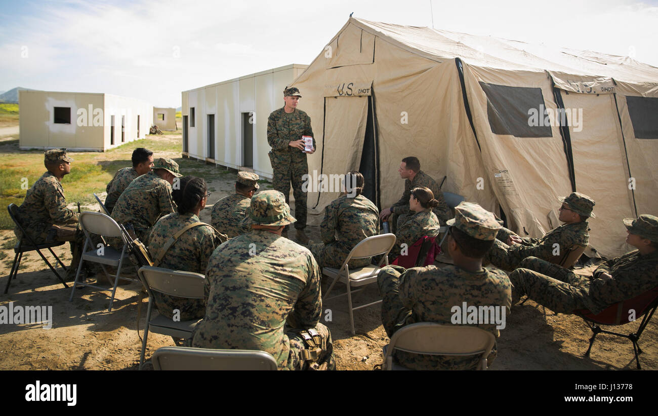 Navy Corpsmen with Combat Logistics Battalion 15, 15th MEU, receive ...