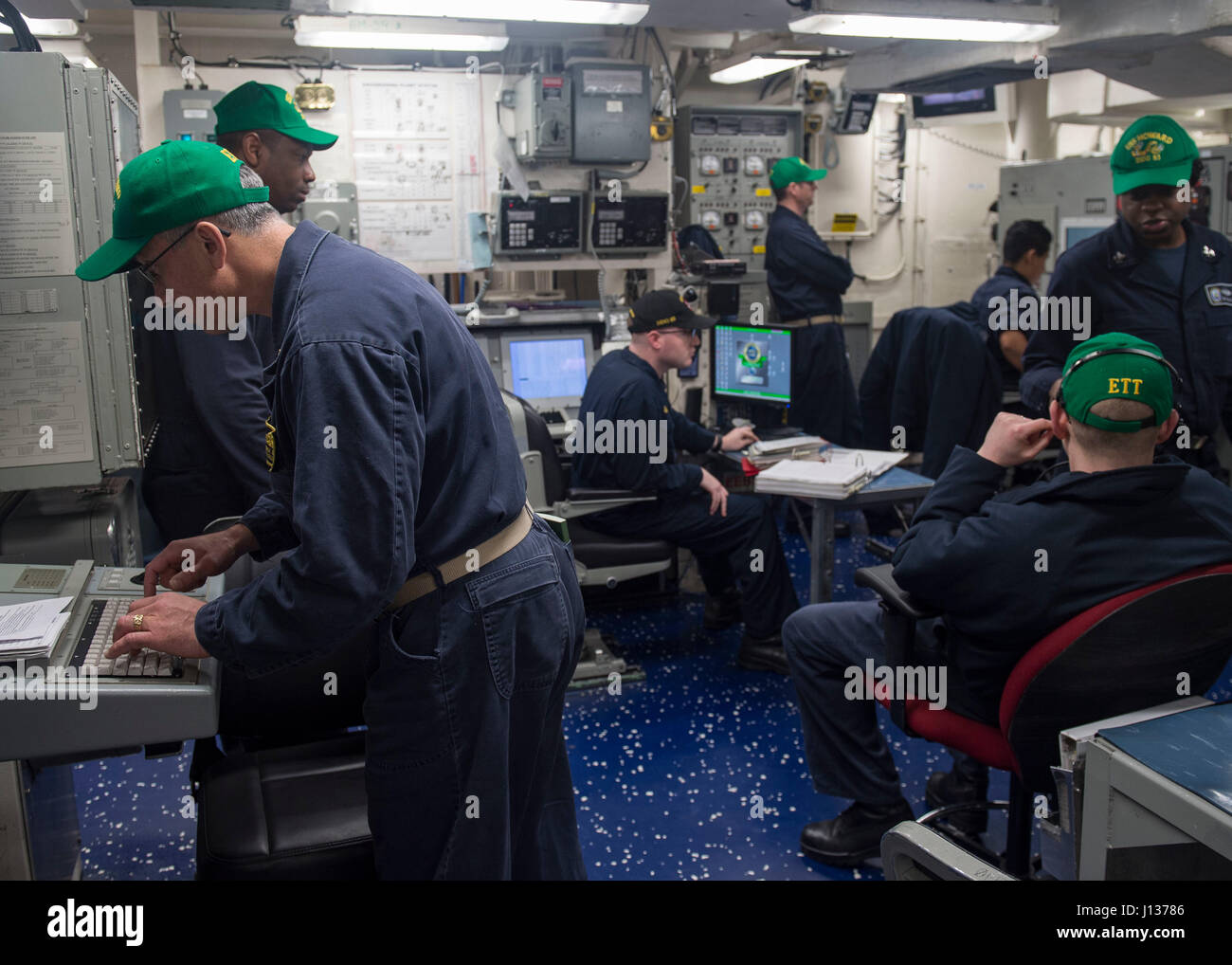 The USS Howard (DDG 83) engineering team operates the central control ...
