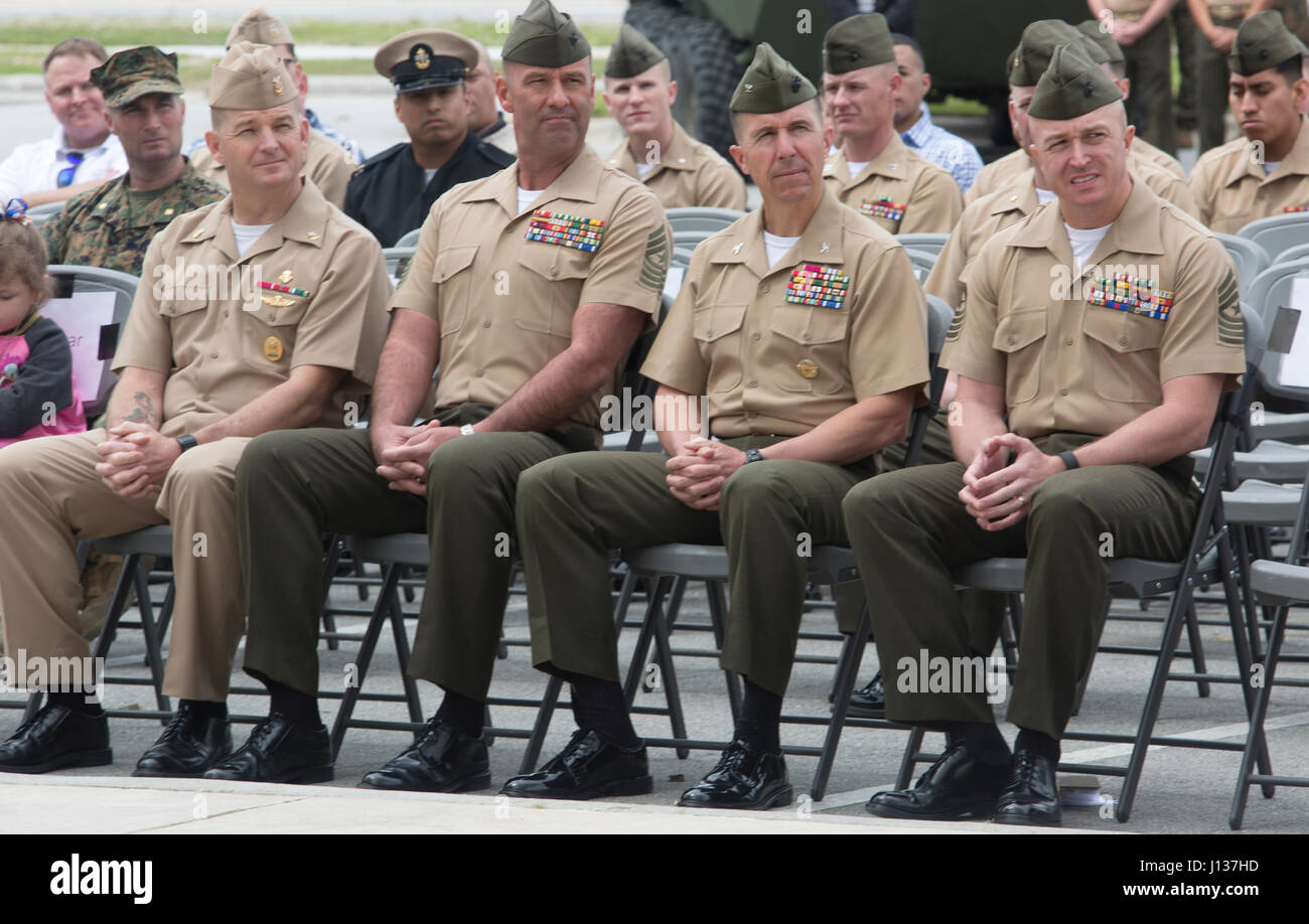 Leaders of 2nd Marine Division sit in the front row during a memorial ...