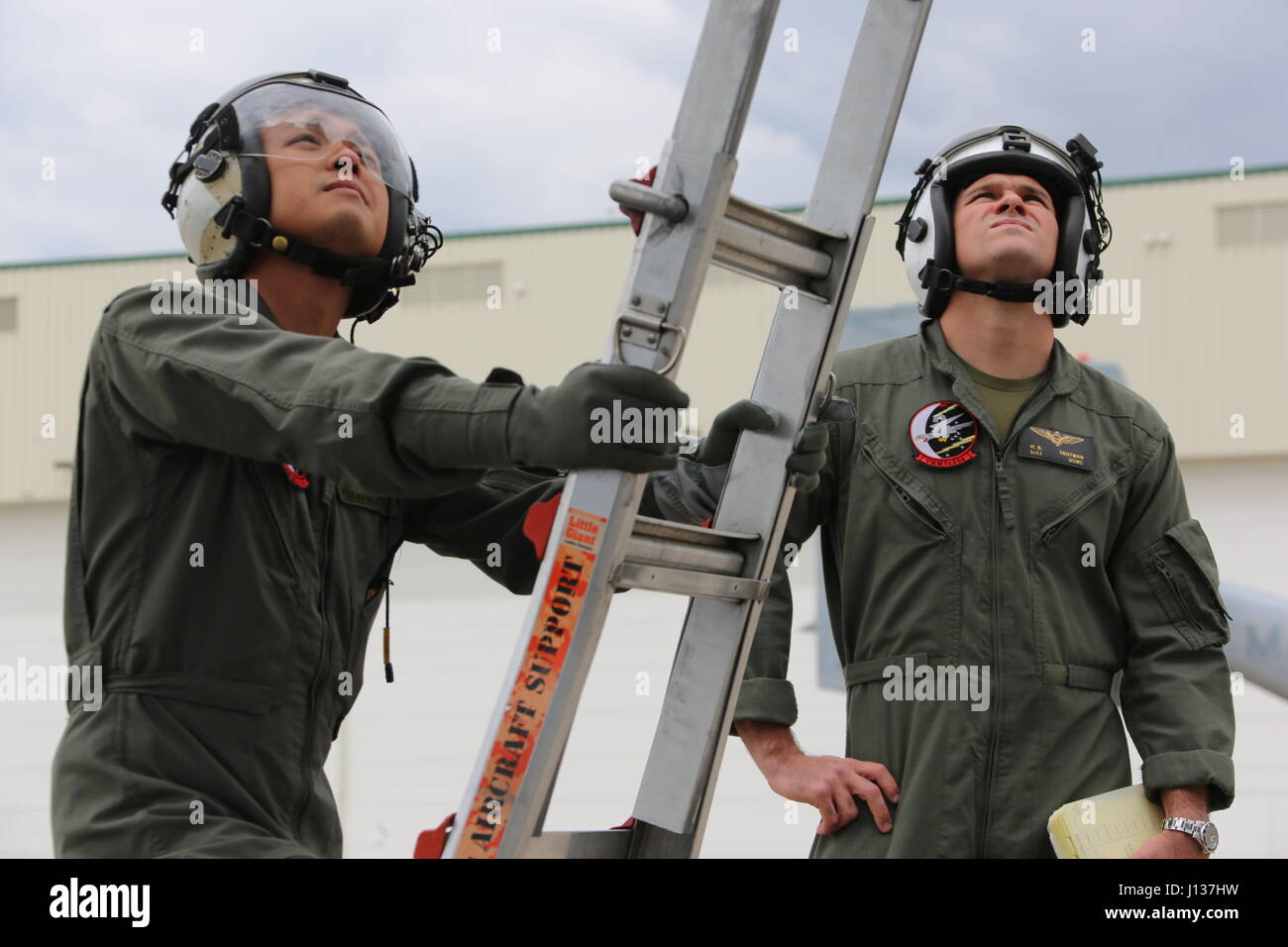 Sgt. 1st Class Midsru Miyazaki, left, and 1st Lt. Hunter Trotman, right ...
