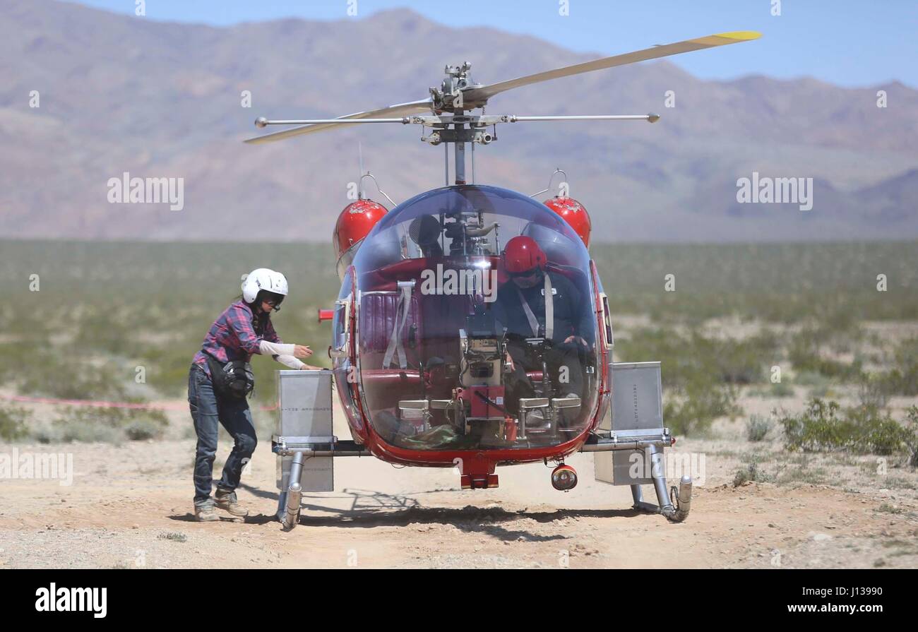 A biologist with Natural Resources and Environmental Affairs places ...