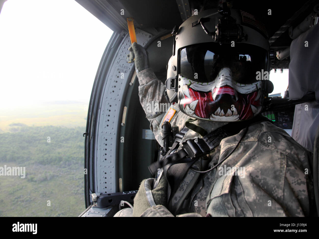 U.S. Army Sgt. Joe Koszyk a Crew Chief from A Company 1/150th Assault ...