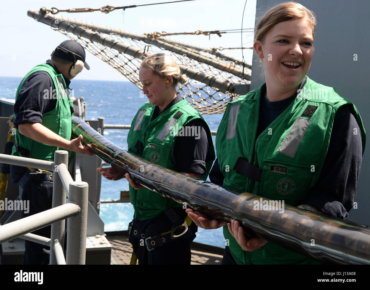 PACIFIC OCEAN (April 11, 2017) U.S. Navy Sailors perform a SLQ-25/25A ...