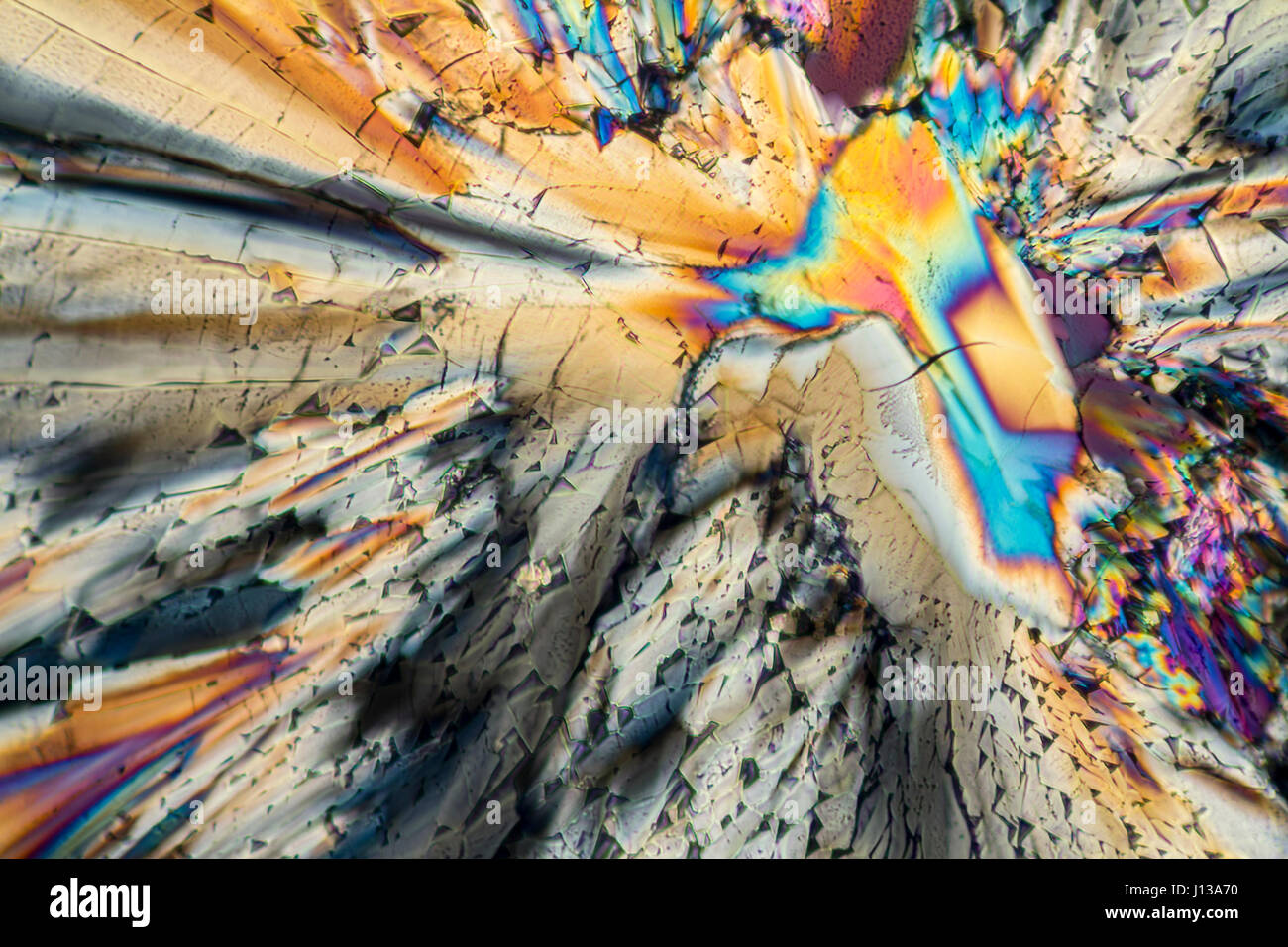 colorful micro crystals of liqueur in polarized light Stock Photo - Alamy