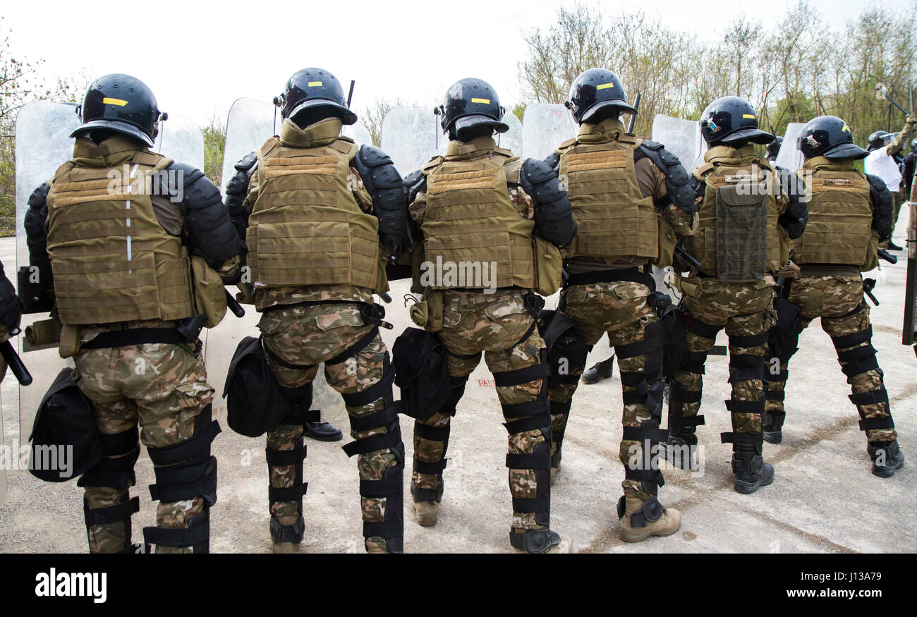 Slovenian KFOR soldiers demonstrate crowd riot control techniques ...