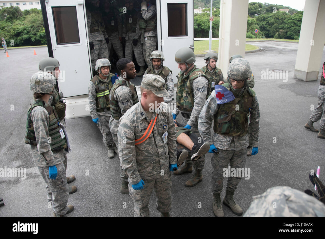 U.S. Air Force Airmen carry a litter during a training exercise April ...