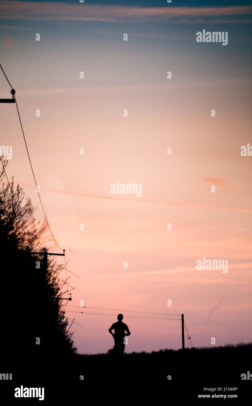 man running outside Stock Photo - Alamy