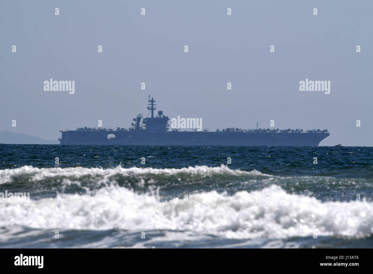 170412-N-AV746-034 PACIFIC OCEAN (April 12, 2017) The aircraft carrier ...