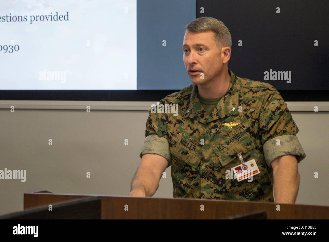 U.S. Marine Corps Lt. Col. Alexander H. Miller, senior watch officer ...