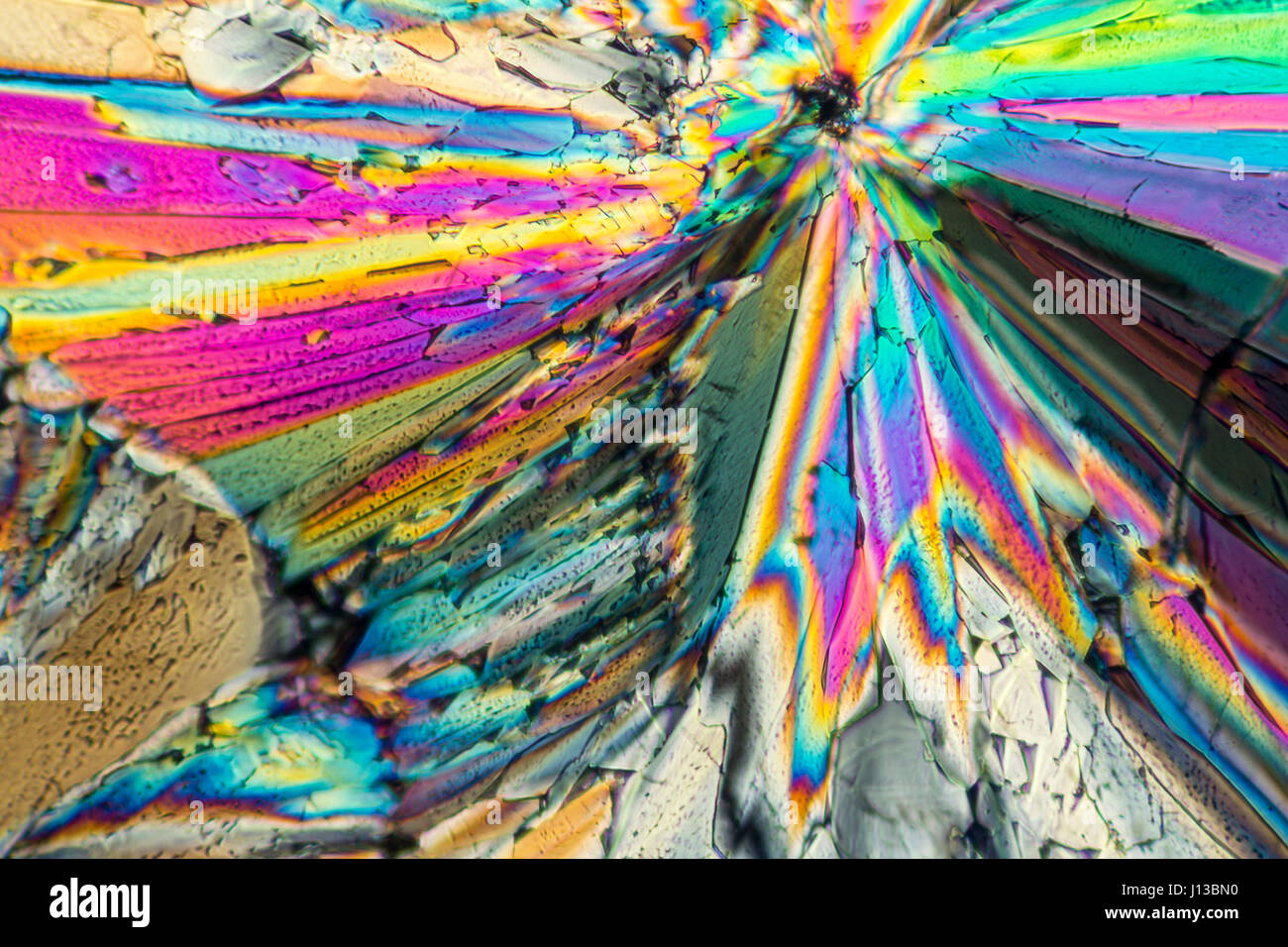 colorful micro crystals of liqueur in polarized light Stock Photo - Alamy