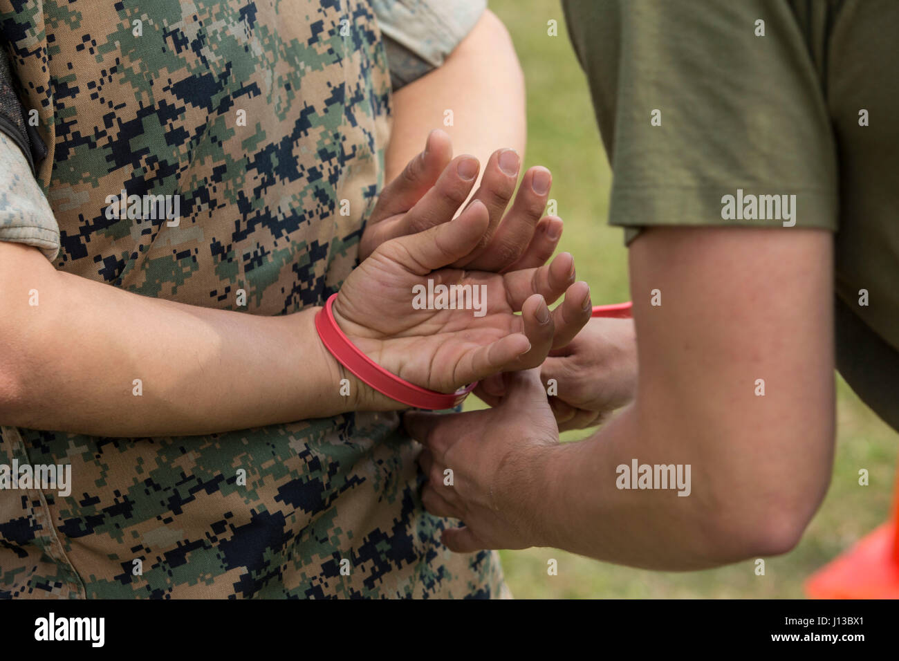 A U.S. Marine with Headquarters and Support Battalion (H&S BN), Marine ...