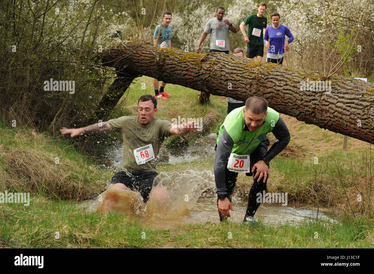 Runners participate in the annual Rugged Terrain Obstacle Run at ...
