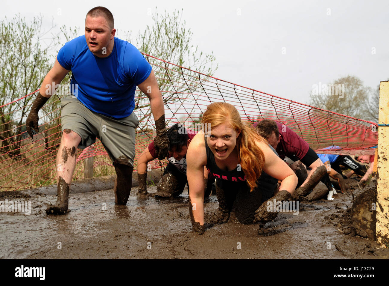 Runners participate in the annual Rugged Terrain Obstacle Run at ...