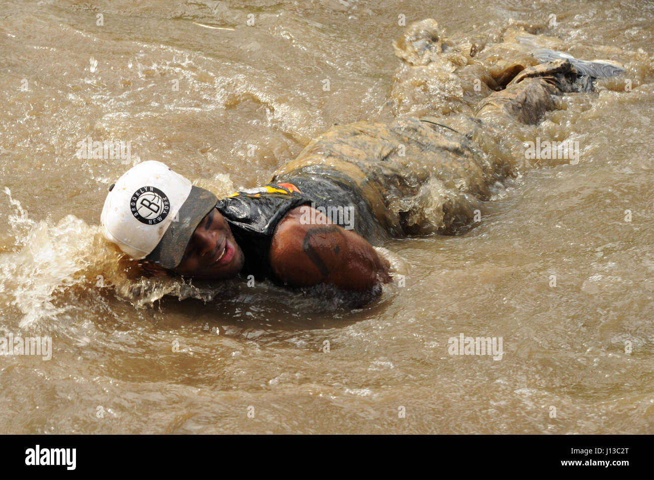 Runners participate in the annual Rugged Terrain Obstacle Run at ...