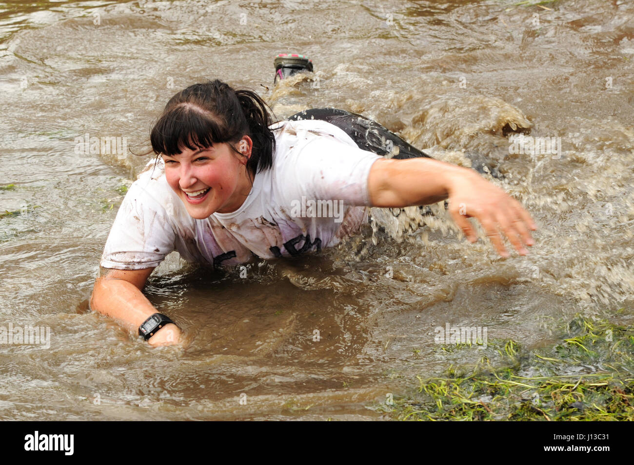 Runners participate in the annual Rugged Terrain Obstacle Run at ...