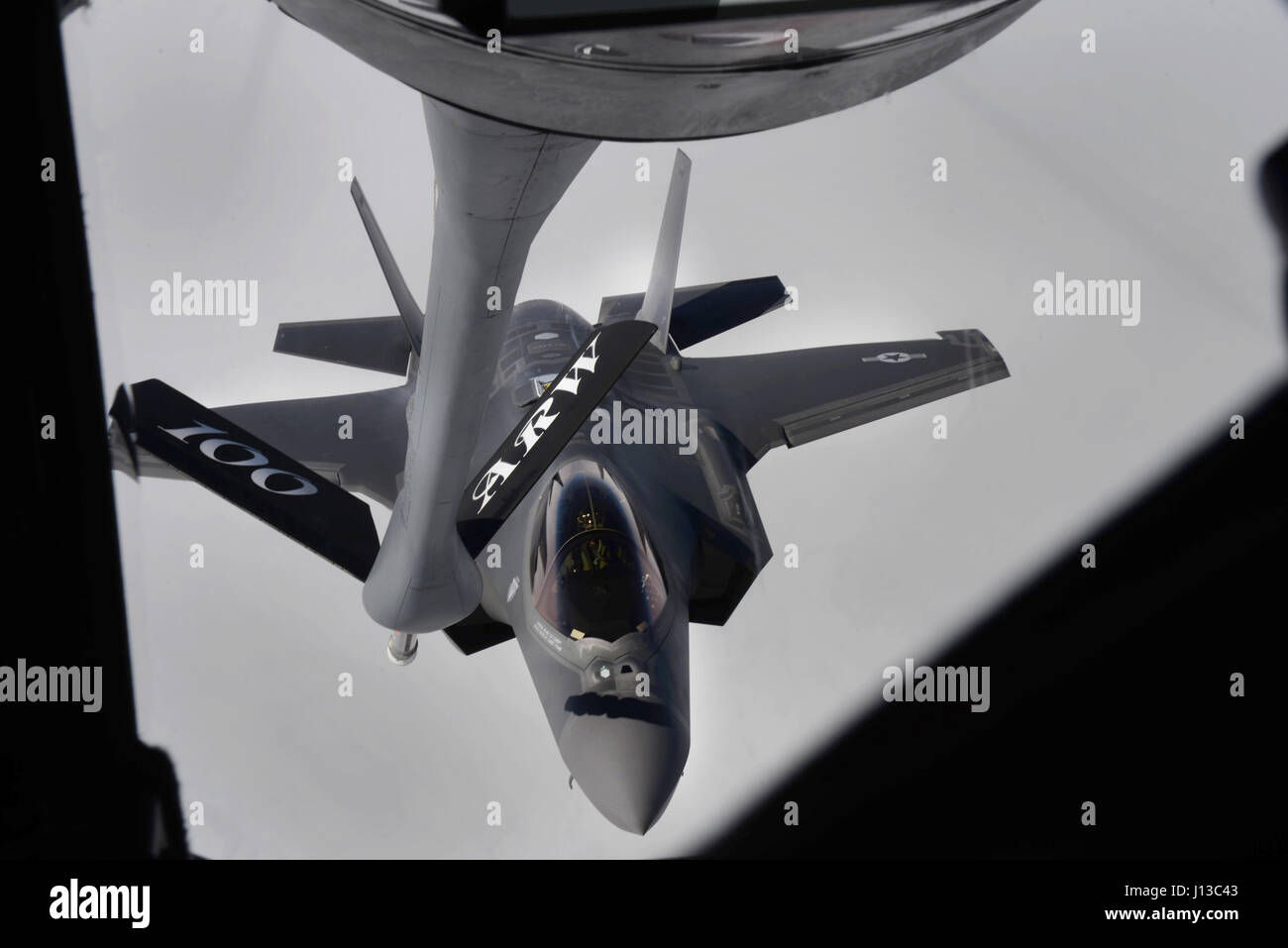 An F-35A Lightning II receives fuel from a 100th Air Refueling Wing KC ...