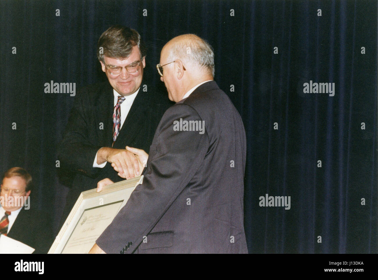 Admin. Atwood Honors-Ceremony USAID - Man receiving award on stage ...