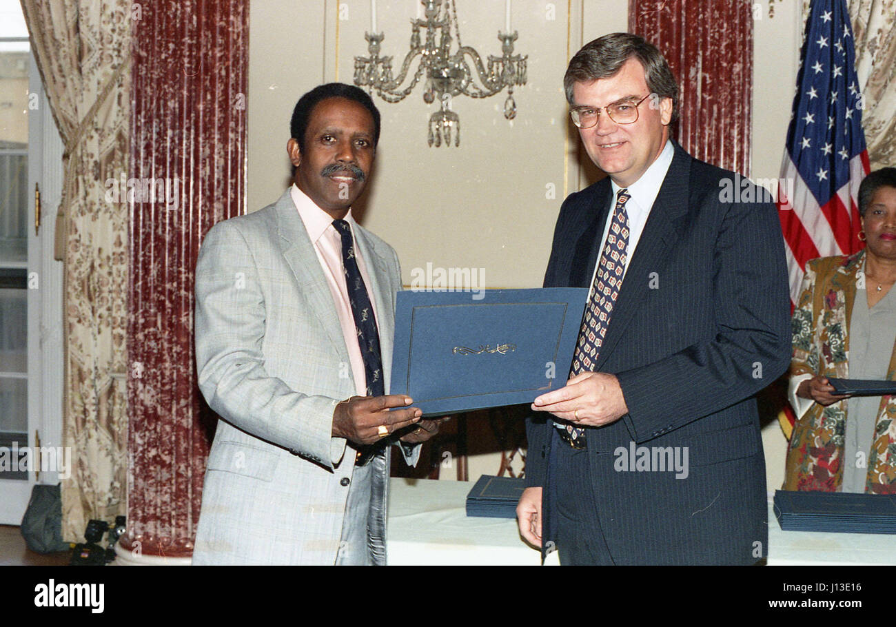 man accepting award taking a picture Stock Photo - Alamy