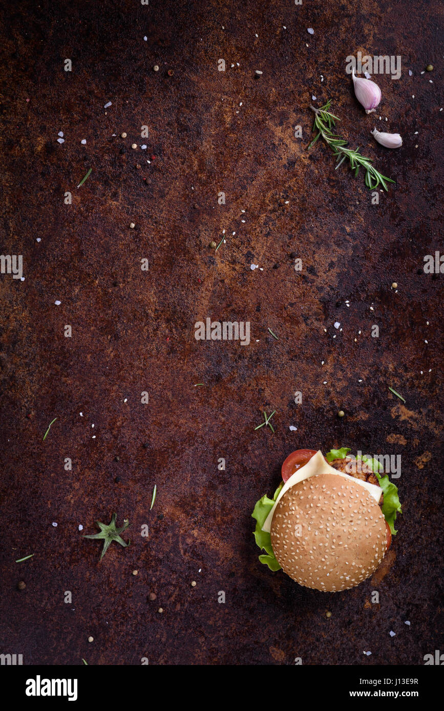 Beef burger in a sesame bun. Restaurant menu frame, mock up. Top view ...