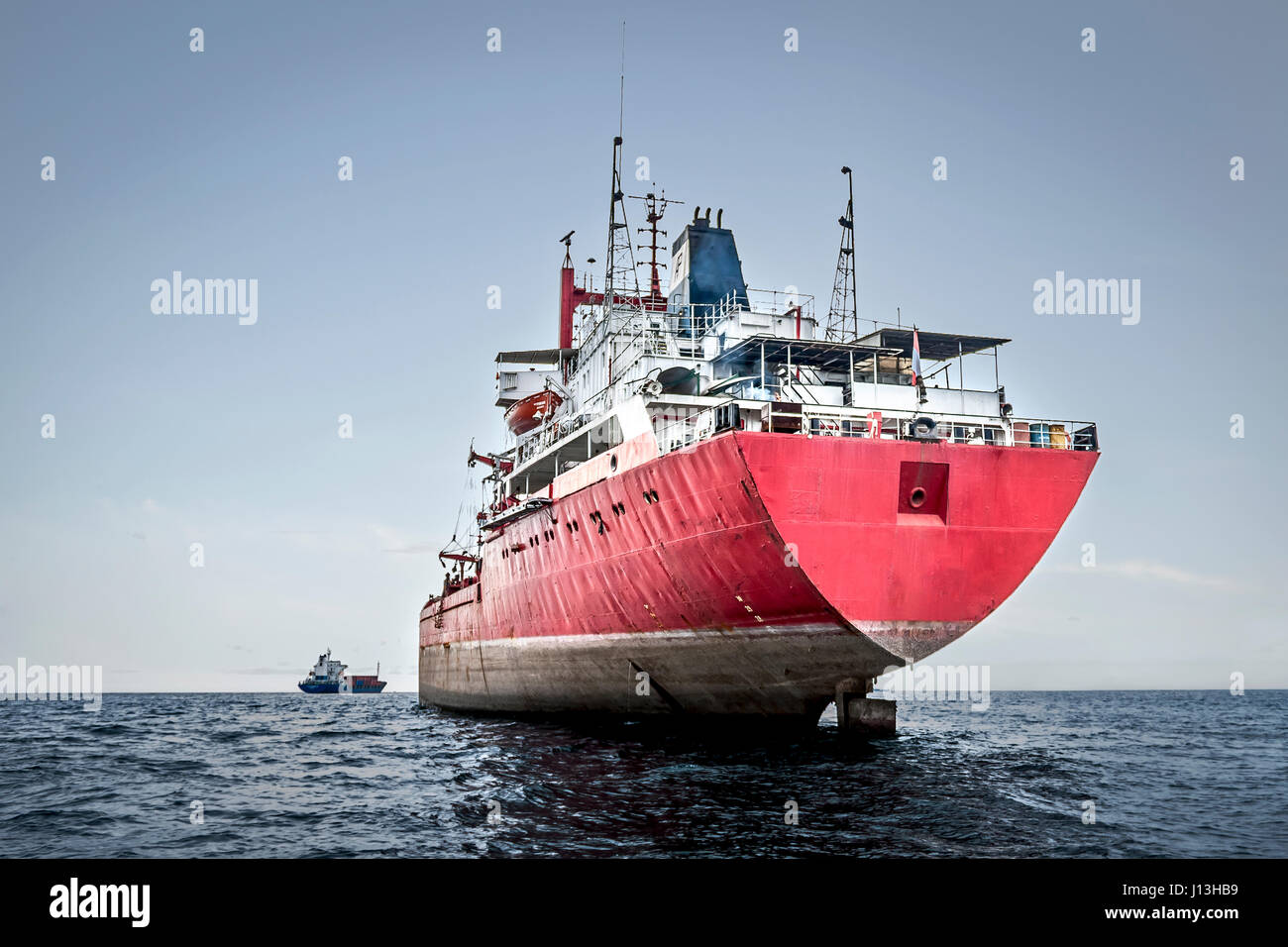 Big red industrial ship Stock Photo - Alamy
