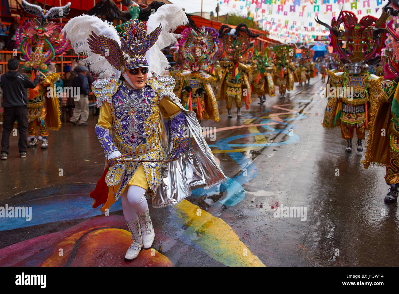Diablada dancers in ornate costumes parade through the mining city of ...