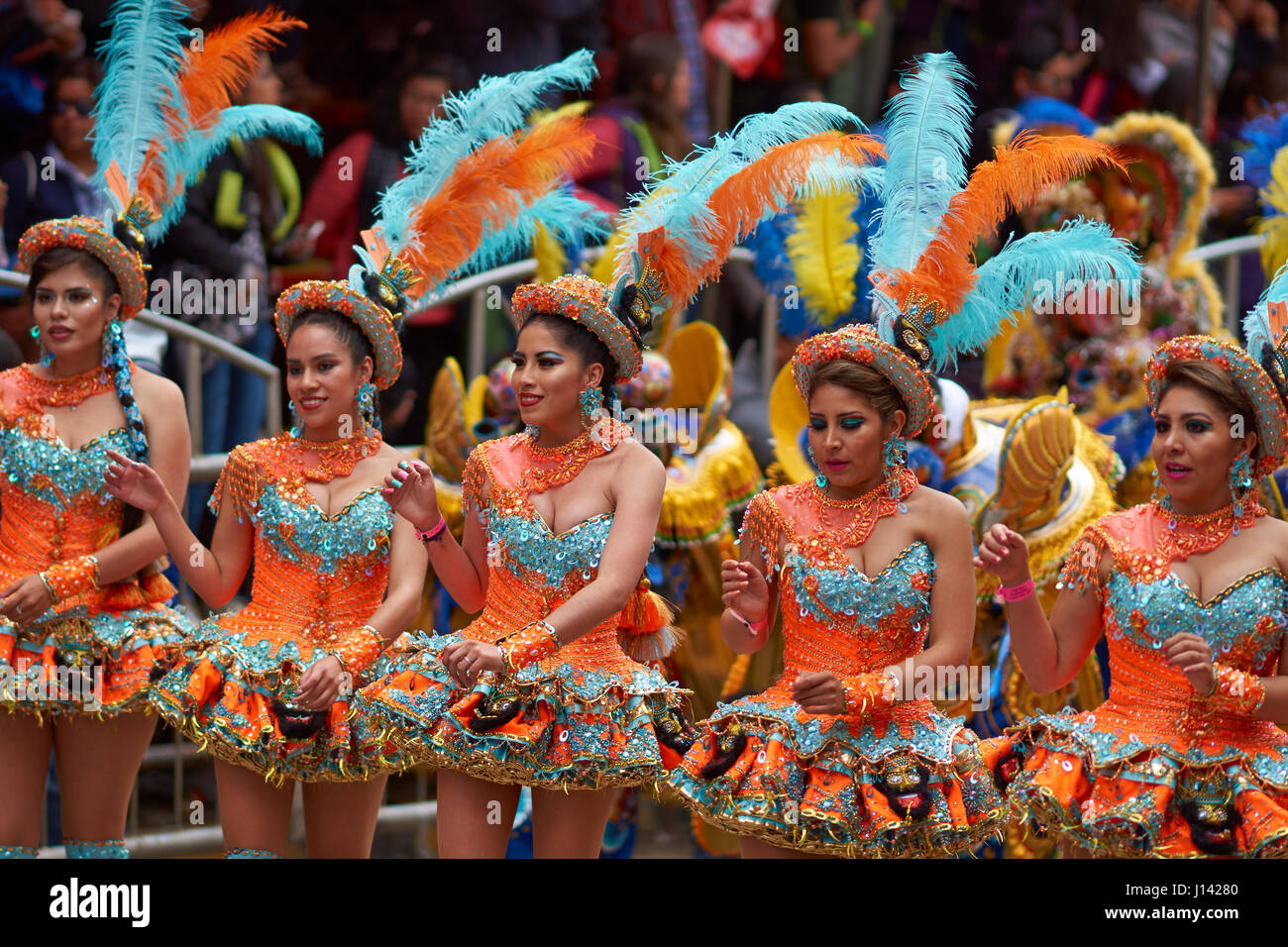 Morenada dancers in ornate costumes parade through the mining city of ...
