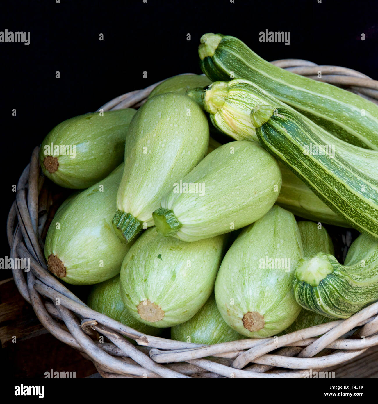 Basket full of squash in the market Stock Photo - Alamy