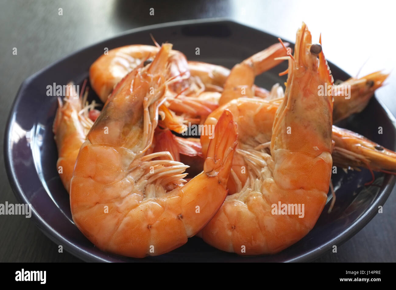 Thai cuisine , Steamed prawns in Purple dish Stock Photo - Alamy