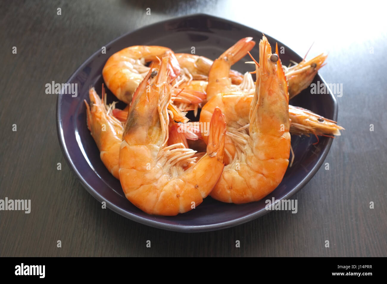 Thai cuisine , Steamed prawns in Purple dish Stock Photo - Alamy