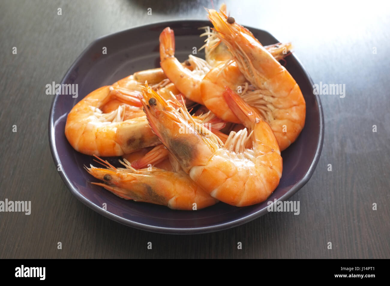 Thai cuisine , Steamed prawns in Purple dish Stock Photo - Alamy