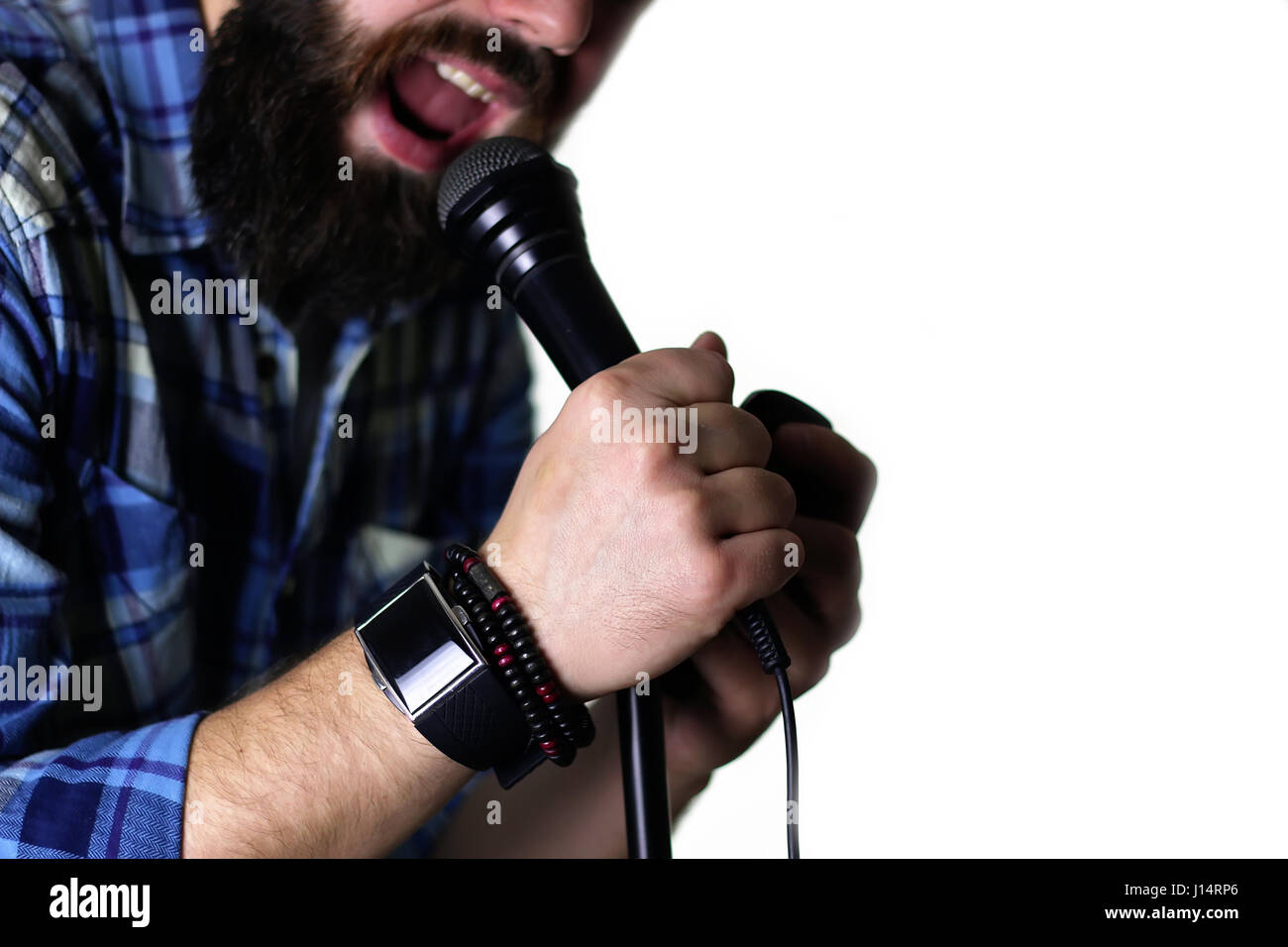microphone on stage hand hold Stock Photo - Alamy