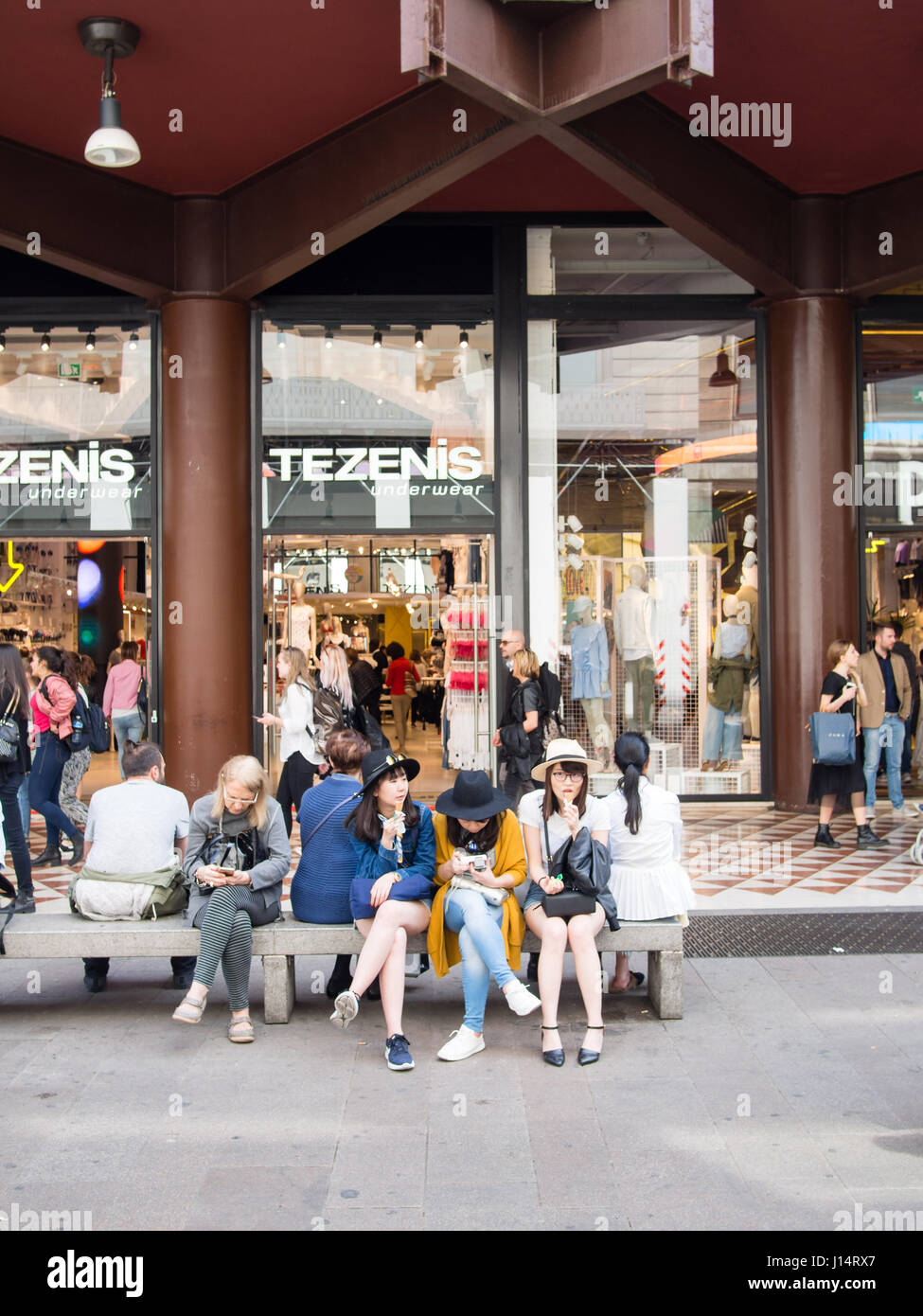 People in the streets of Duomo area in Milano - April 2017 Stock Photo ...
