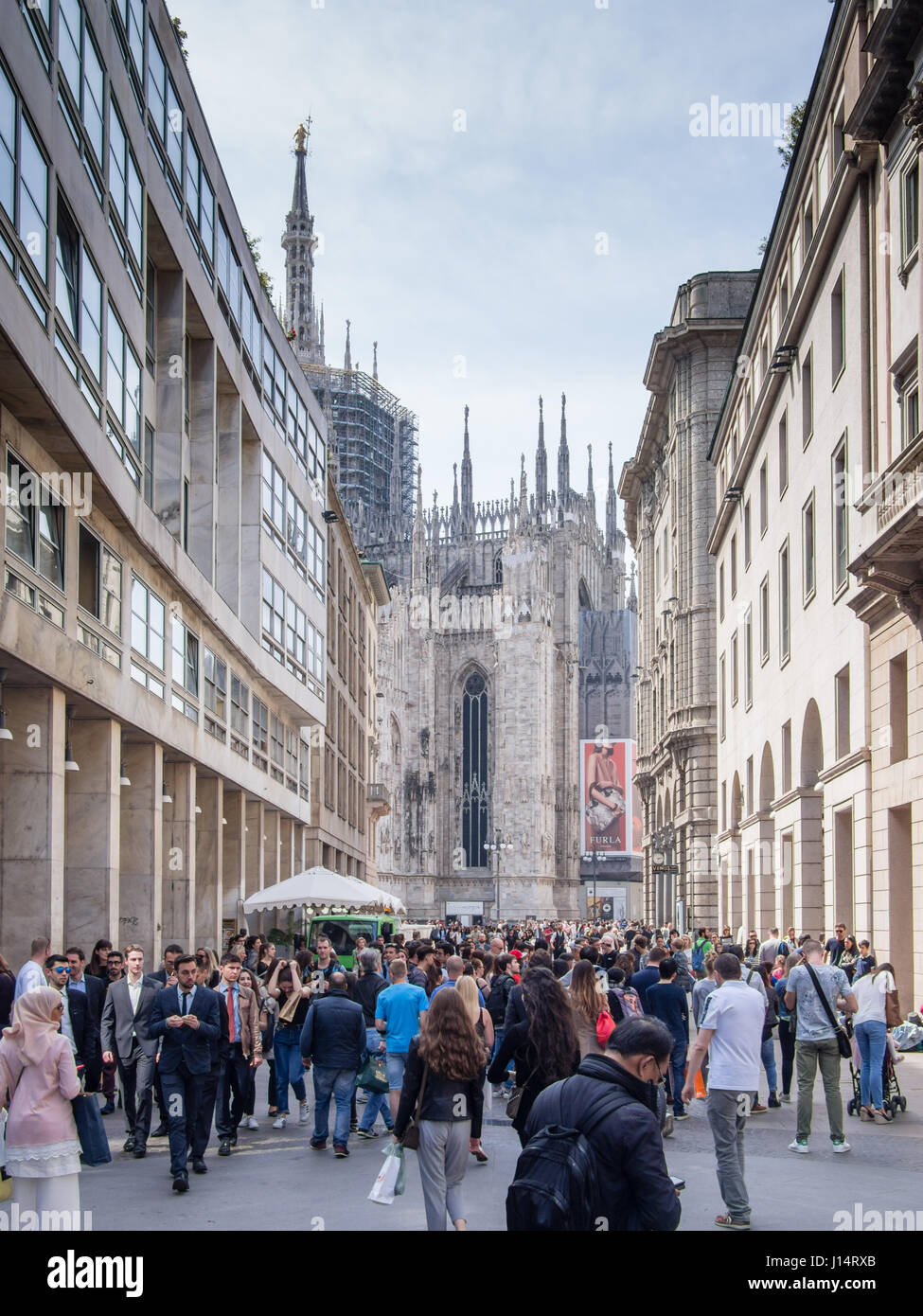 People in the streets of Duomo area in Milano - April 2017 Stock Photo ...