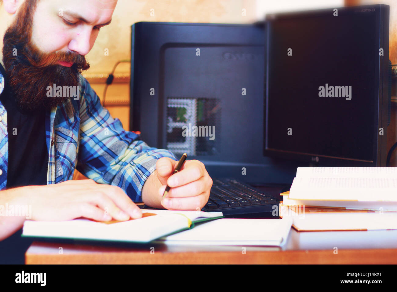 male work computer pen write Stock Photo - Alamy