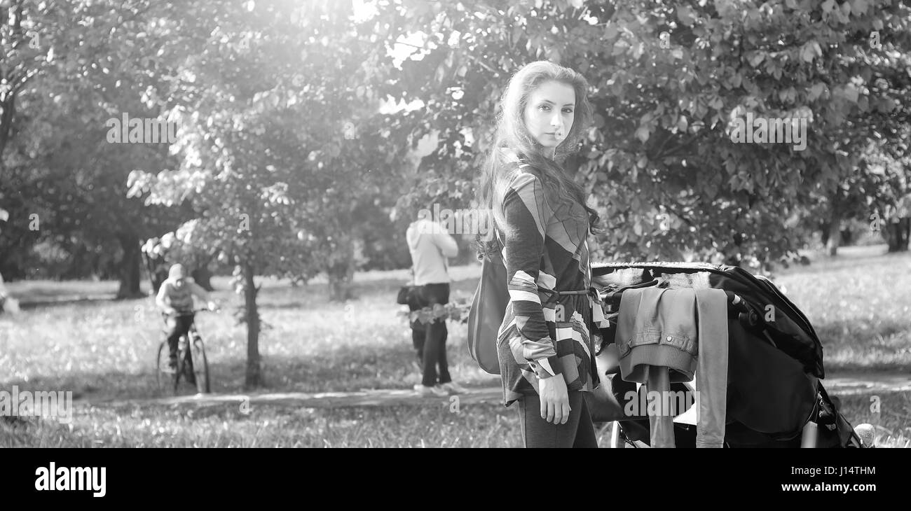 walk women with stroller summer sunlight Stock Photo - Alamy