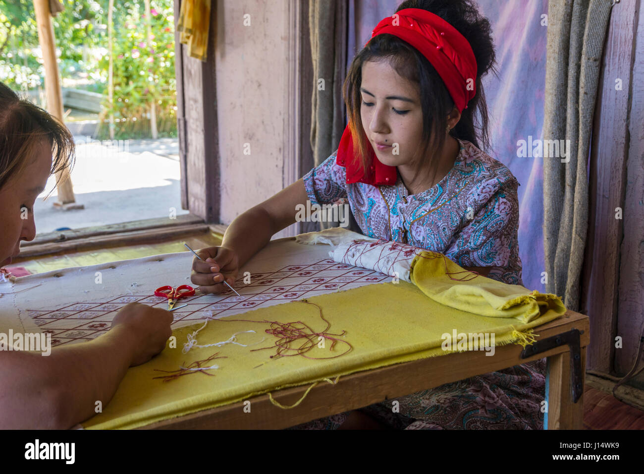 Woman hand embroidery hi-res stock photography and images - Alamy