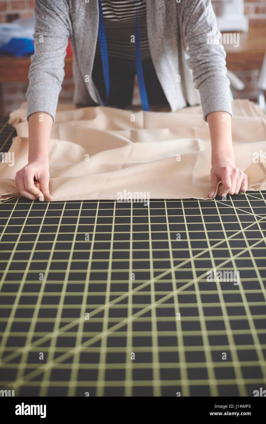 Tailor measuring hi-res stock photography and images - Alamy