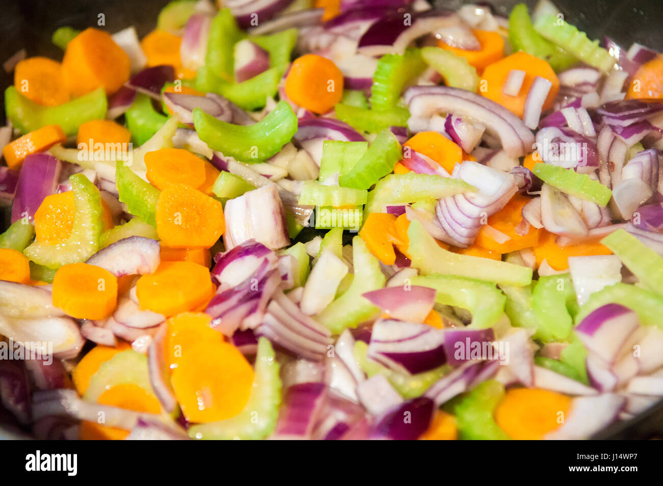 Fresh food ingredients cooking in the pan Stock Photo - Alamy