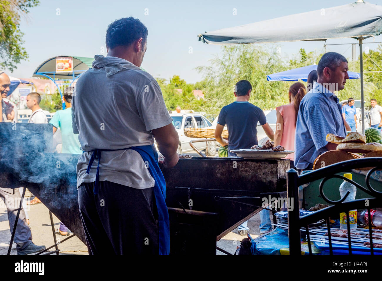 Barbecue flame man fire hand food hi-res stock photography and images ...