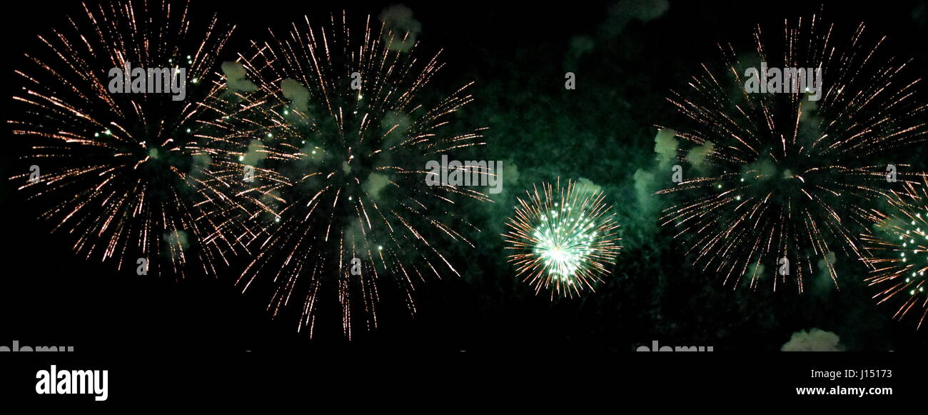 Festive fireworks in night sky. A single shot of the colorful fireworks ...