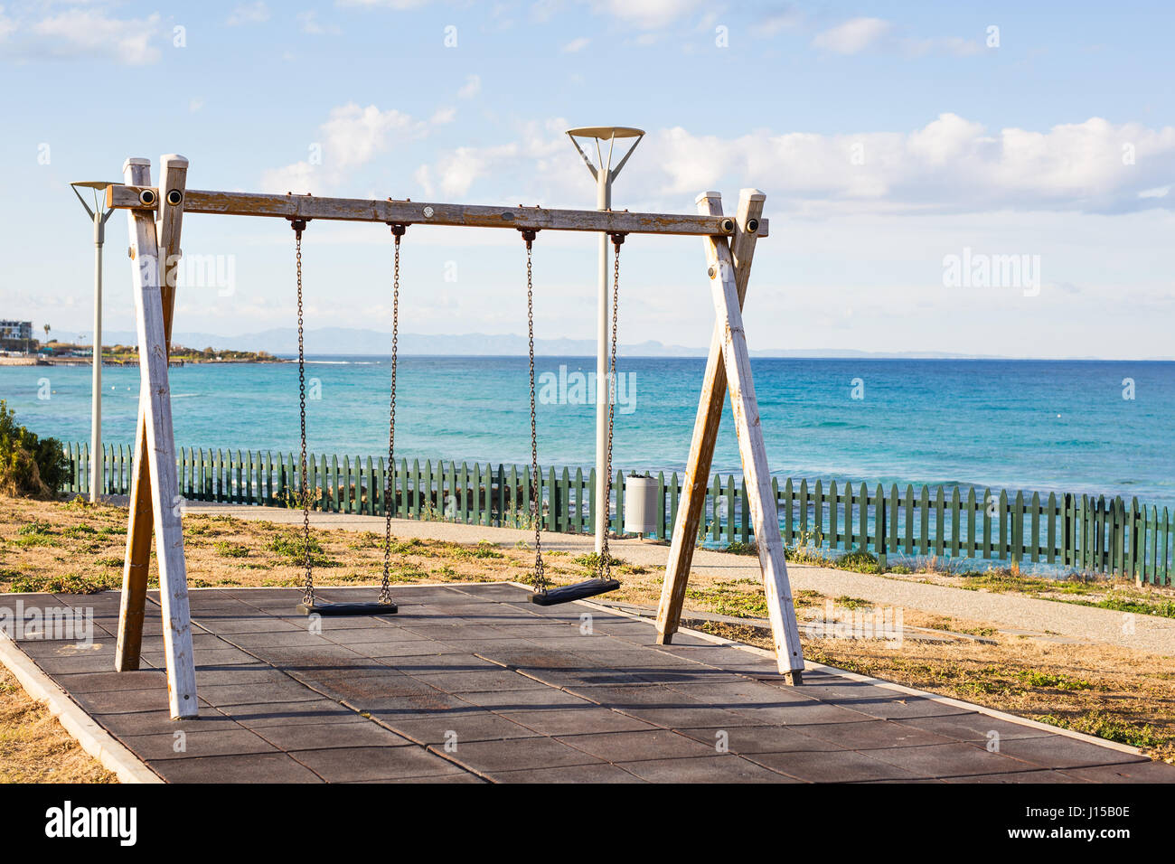Children swing at Playground Stock Photo - Alamy