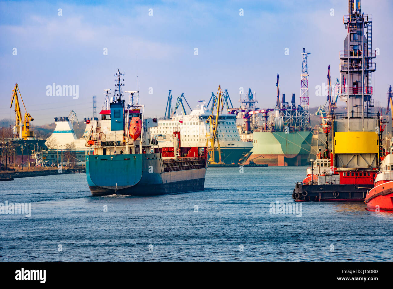 A cargo ship entering port of Gdansk, Poland Stock Photo - Alamy